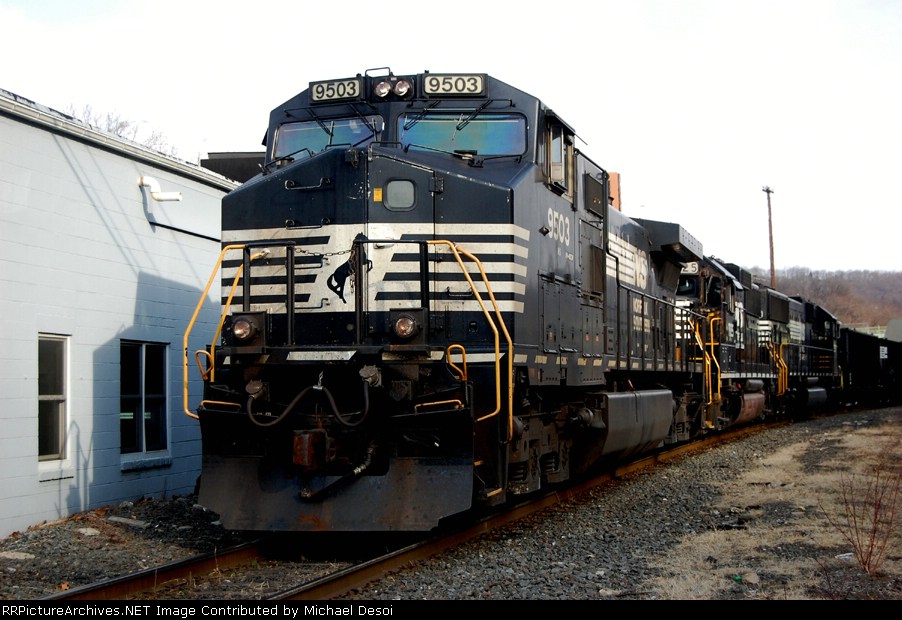 NS C40-9W #9503 leads an empty coal train off the Portland Secondary at Union Square